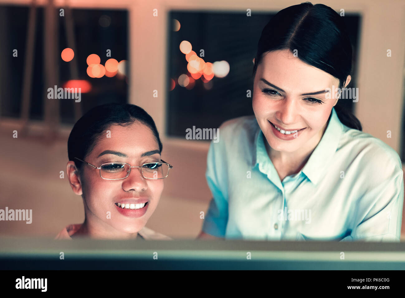 Hardworking workers learning how to work with new software Stock Photo ...