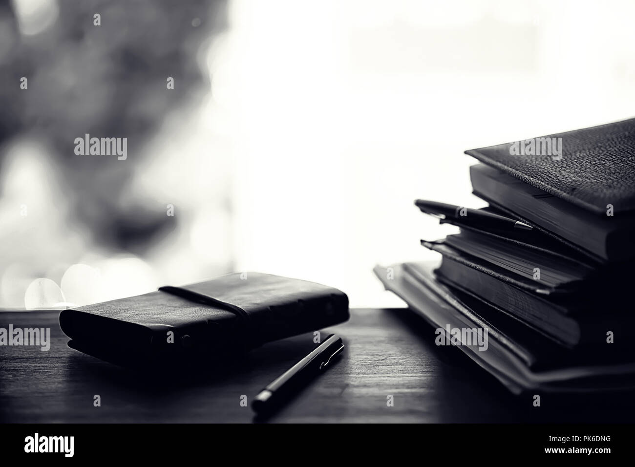 A stack of textbooks on a table Stock Photo - Alamy