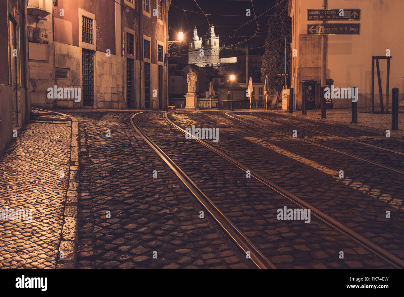 Old European city street at night, Lisbon, Portugal Stock Photo - Alamy