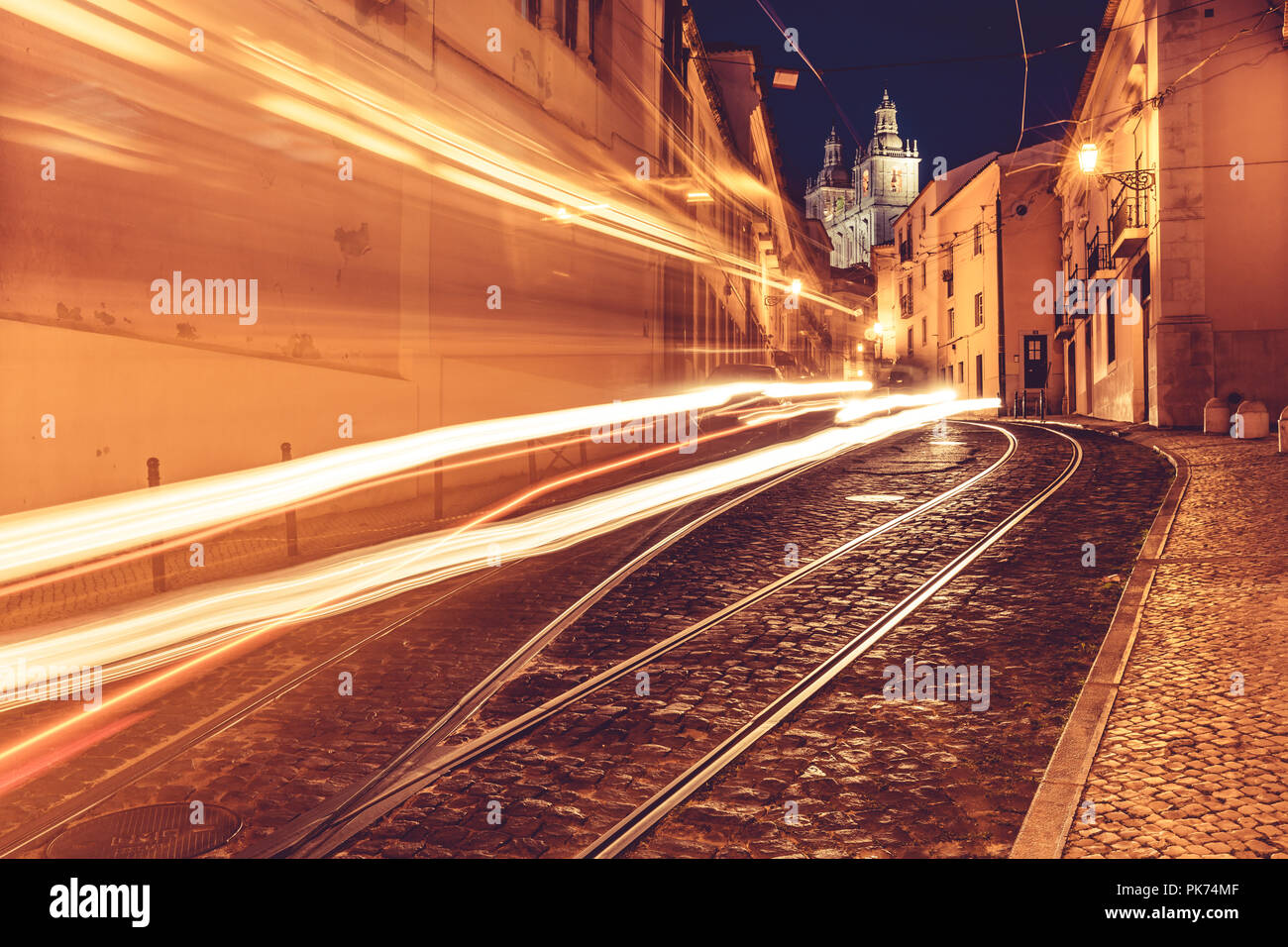 Old European city street and night traffic light, Lisbon, Portugal ...