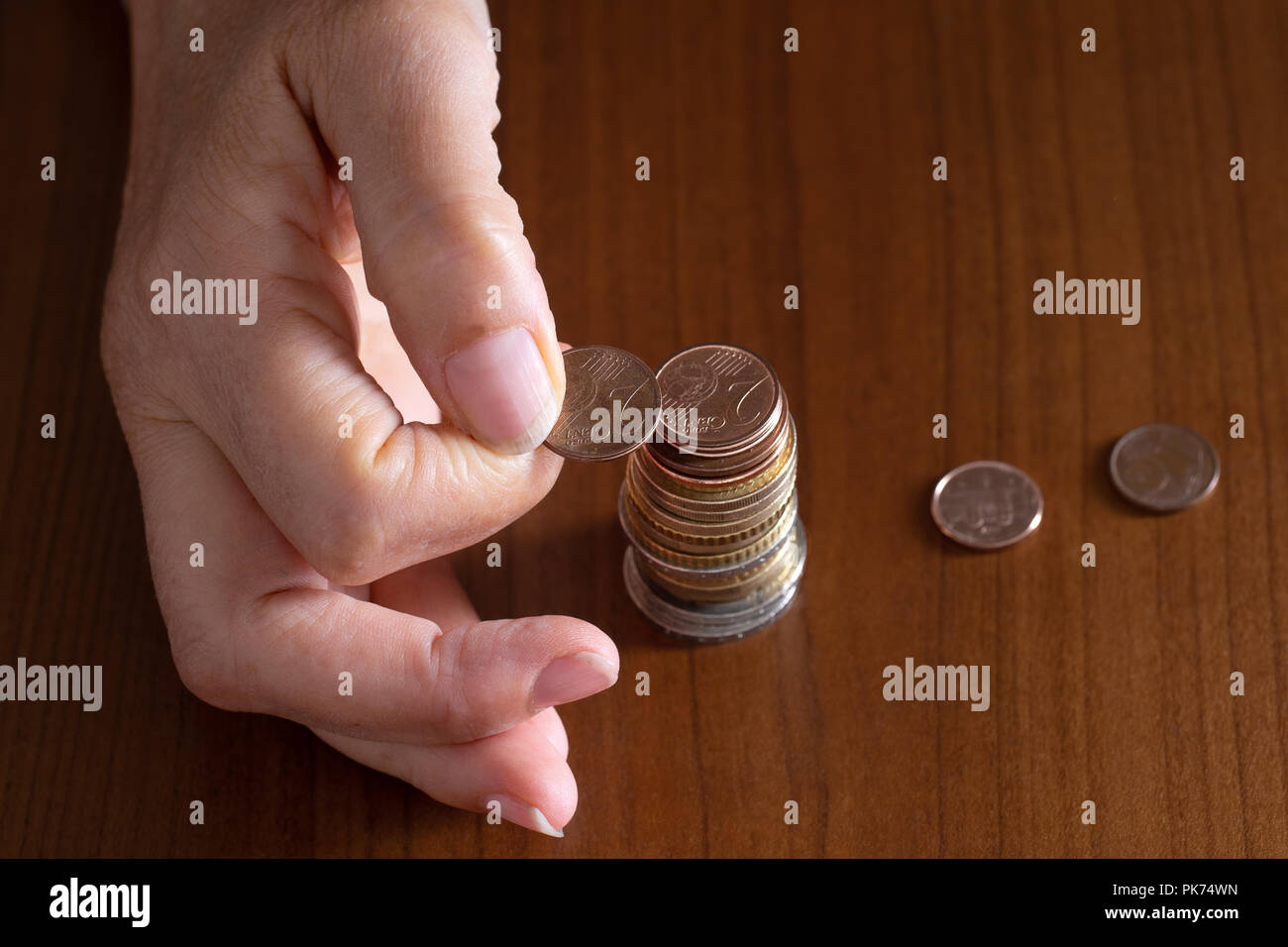 Counting money small change hi-res stock photography and images - Alamy