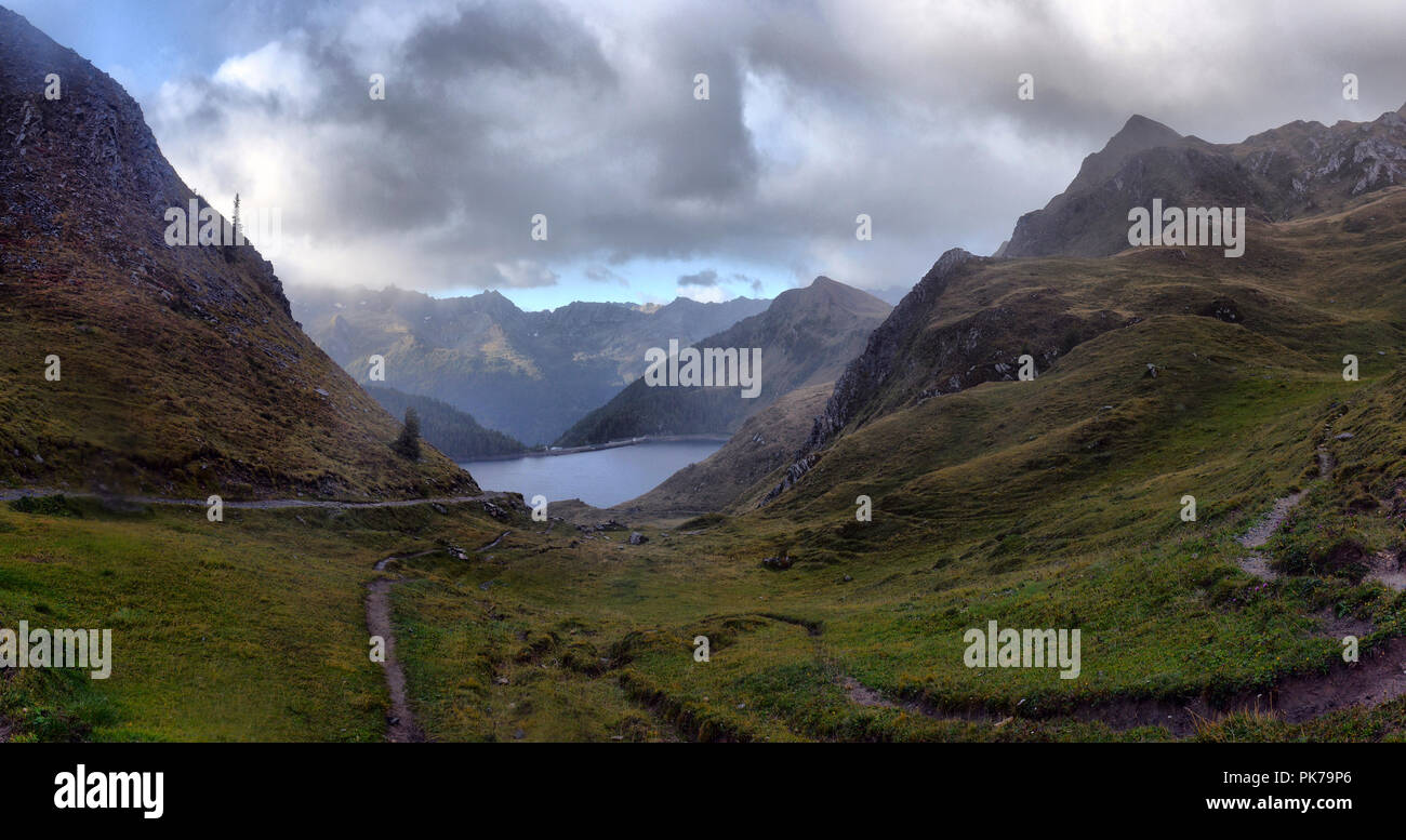 mountain landscape with a lake at dawn in the Alps Stock Photo - Alamy
