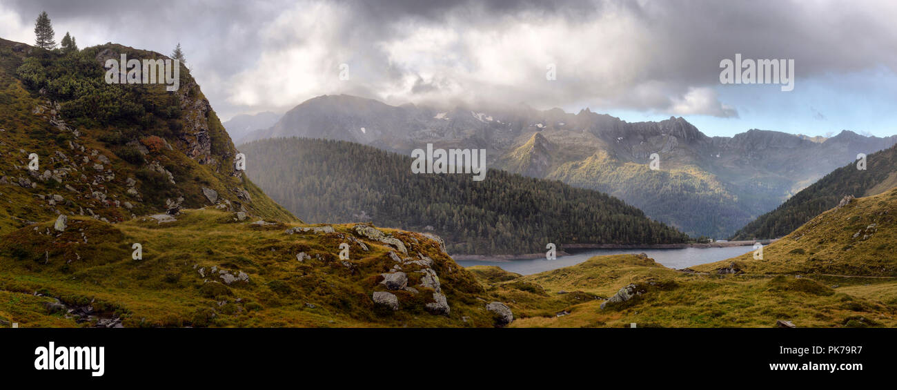 mountain landscape with a lake at dawn in the Alps Stock Photo - Alamy