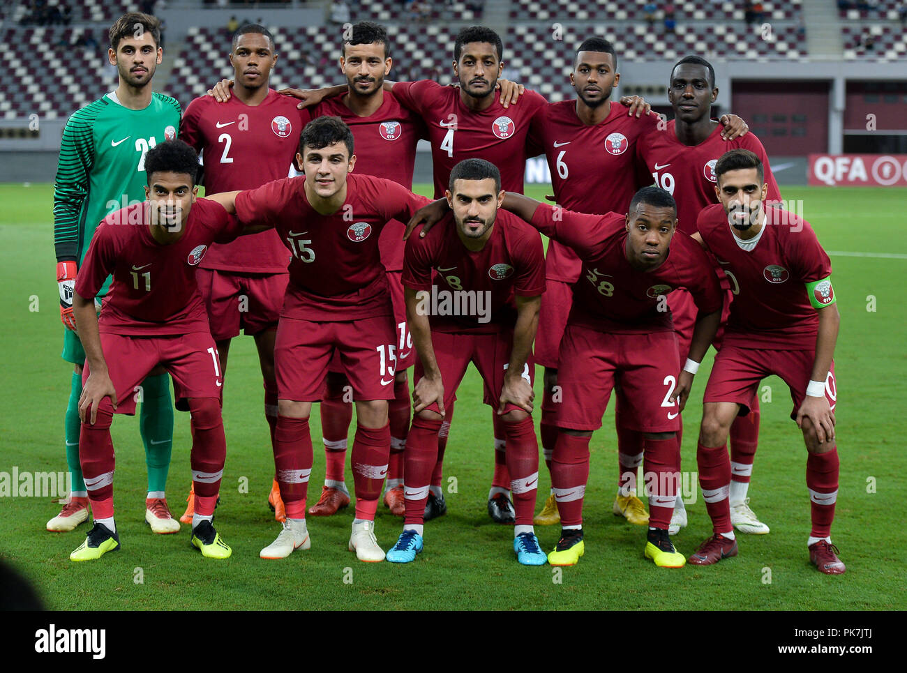 Doha. 11th Sep, 2018. Players of Qatar line up ahead of an ...