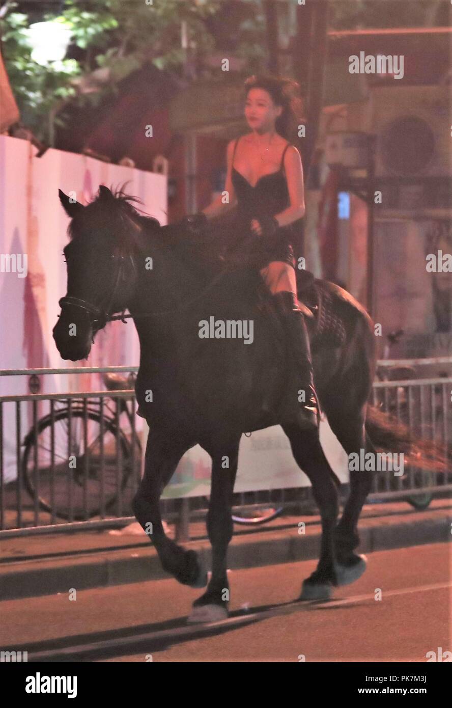 Shanghai, Shanghai, China. 12th Sep, 2018. Shanghai, CHINA-A woman ...