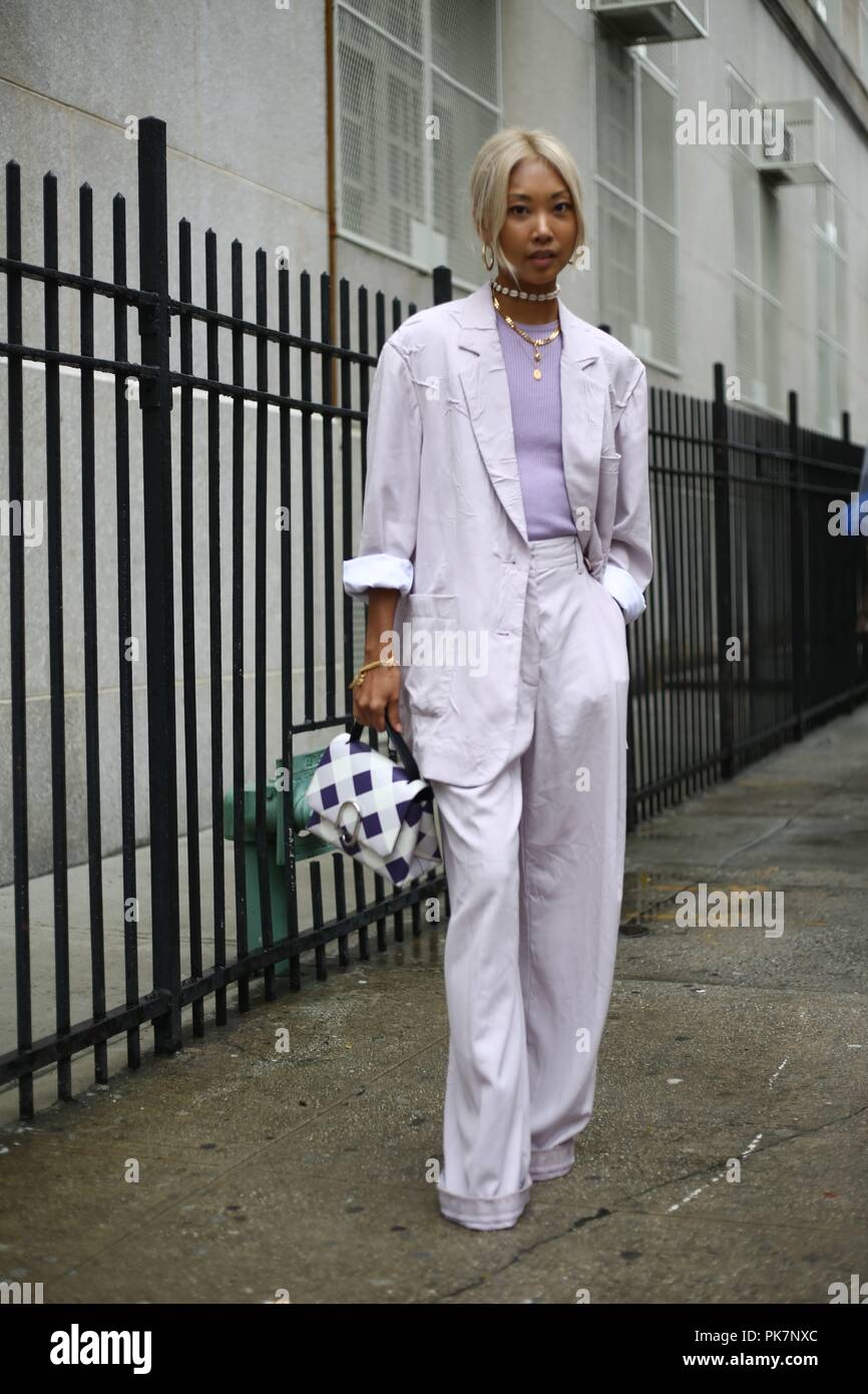 Blogger Vanessa Hong posing on the street outside of the 3.1 Phillip ...