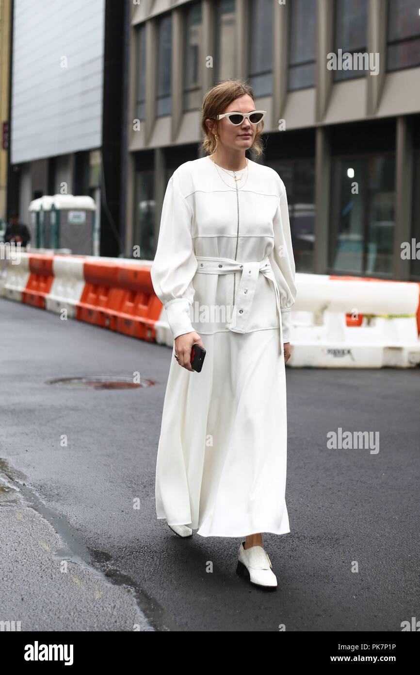 Madelynn Furlong posing on the street outside of the 3.1 Phillip Lim ...