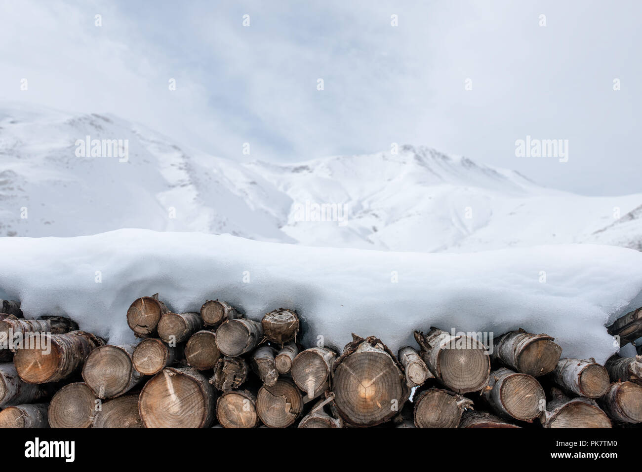 Snowy background with wood pieces. Winter concept Stock Photo - Alamy