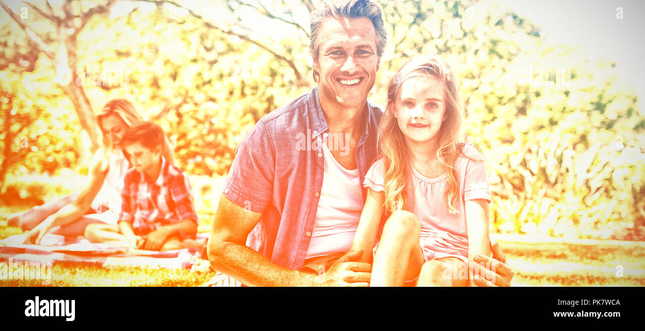Daughter sitting on fathers lap hi-res stock photography and images - Alamy