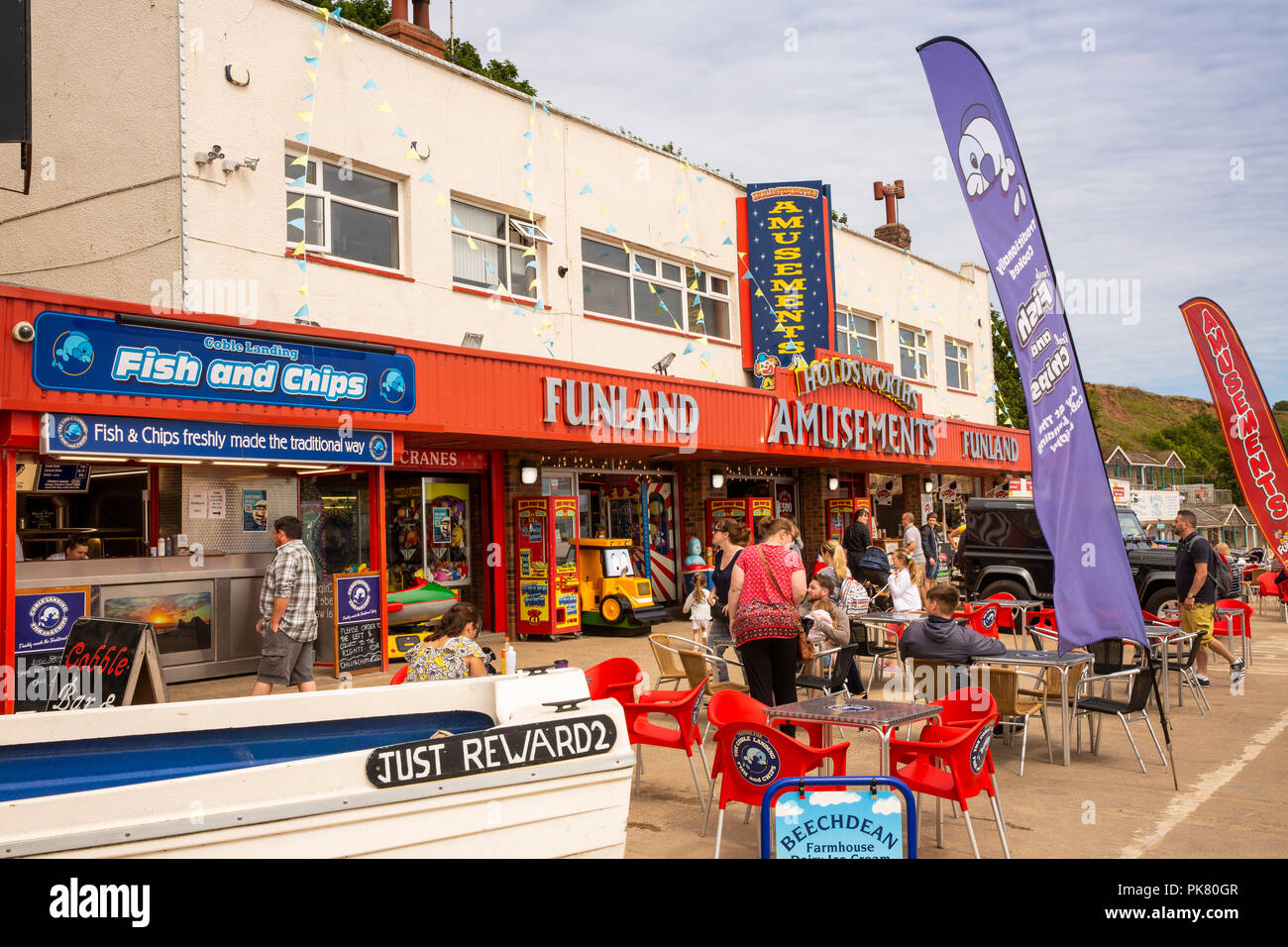 UK, England, Yorkshire, Filey, visitors at Coble Landing fish and chip ...