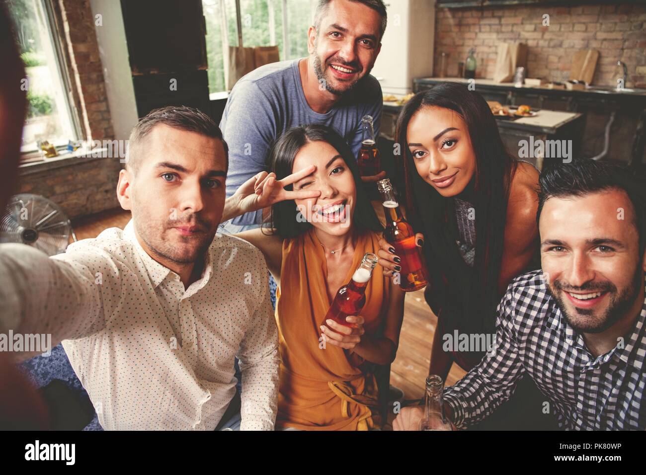 Female friends having fun selfie hi-res stock photography and images ...