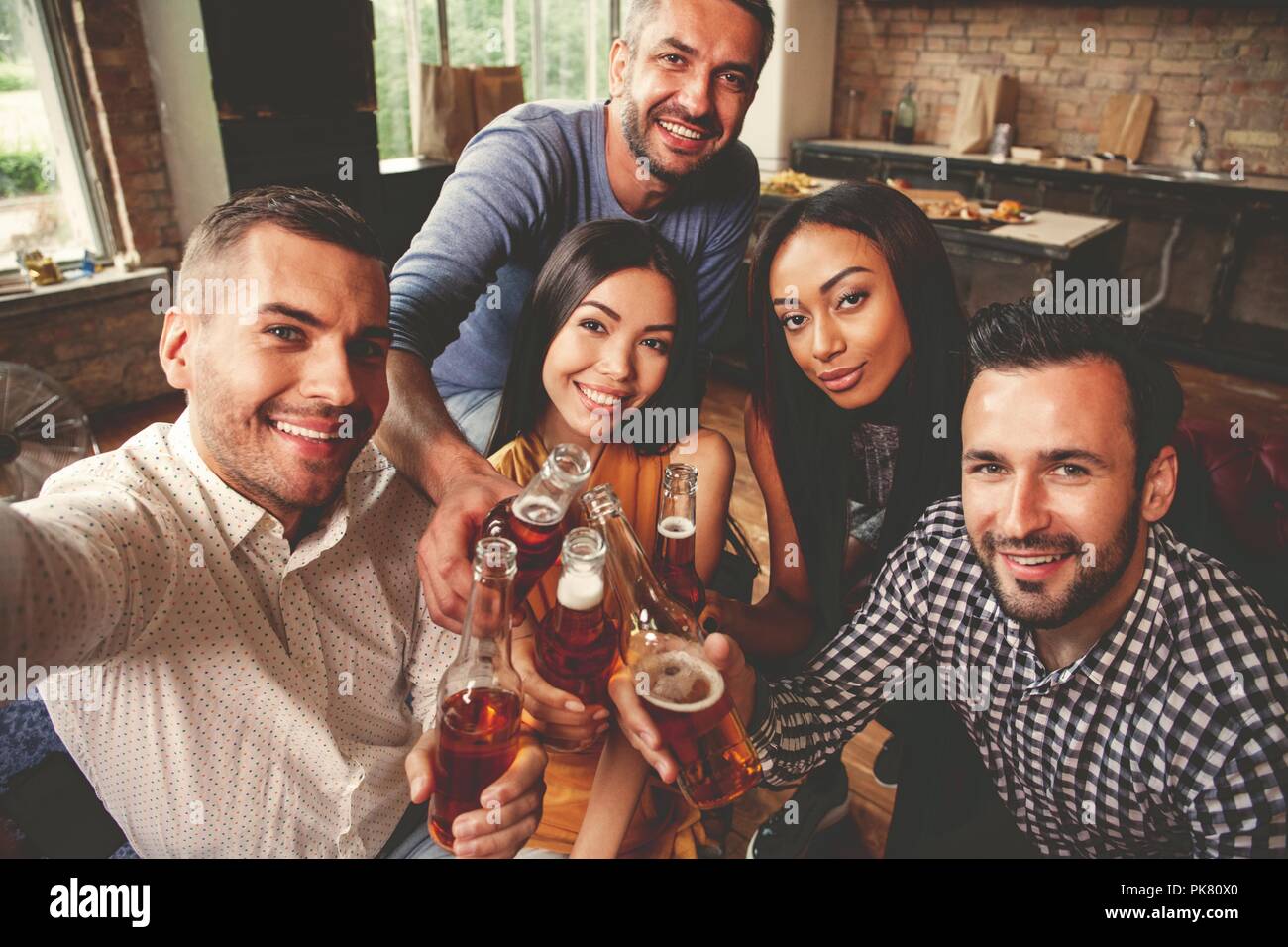 Friends making selfie celebrating hi-res stock photography and images ...