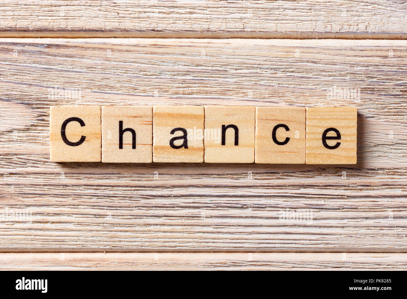 CHANCE word written on wood block. CHANCE text on table, concept Stock ...