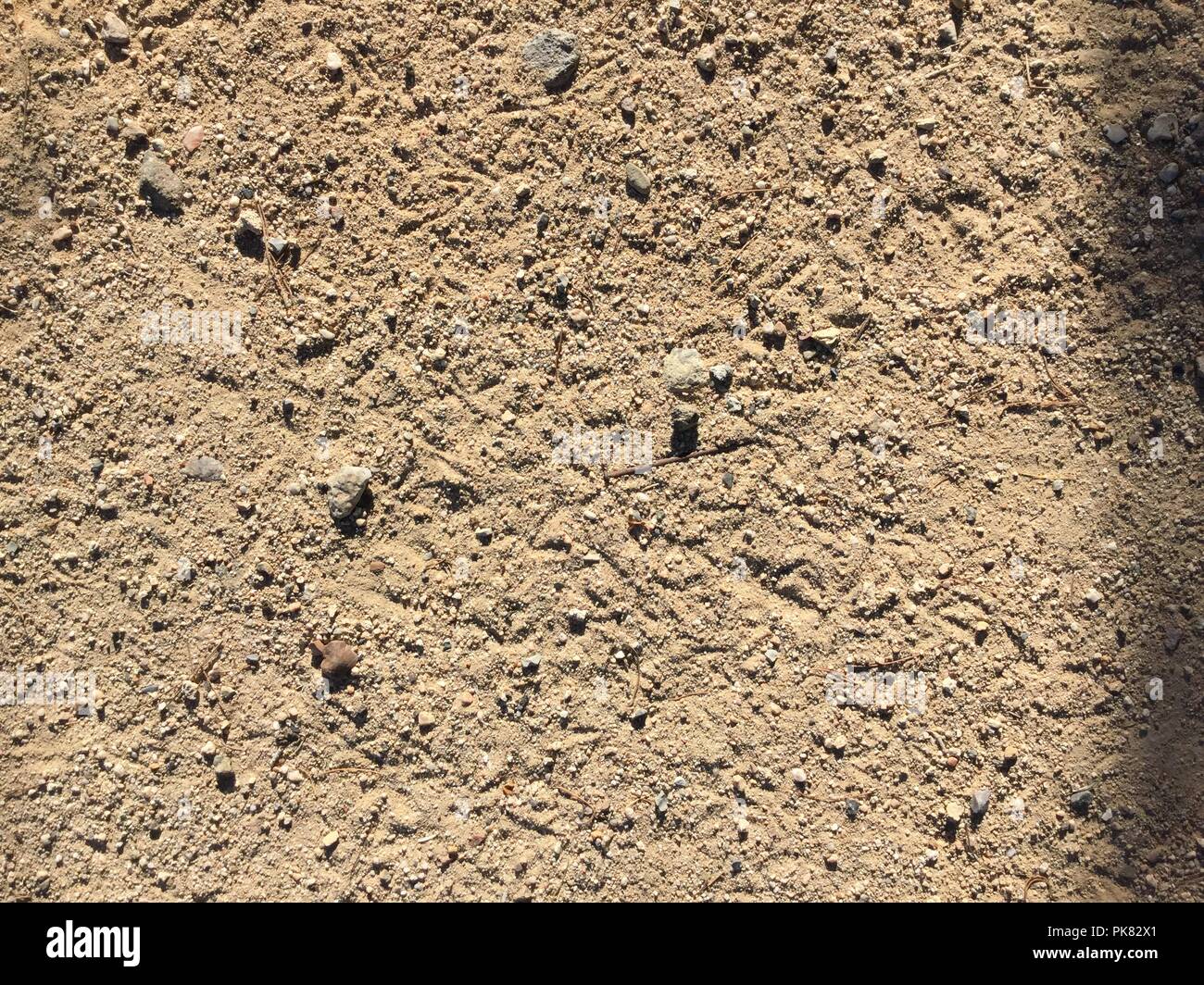 Dirt with small tracks Stock Photo - Alamy