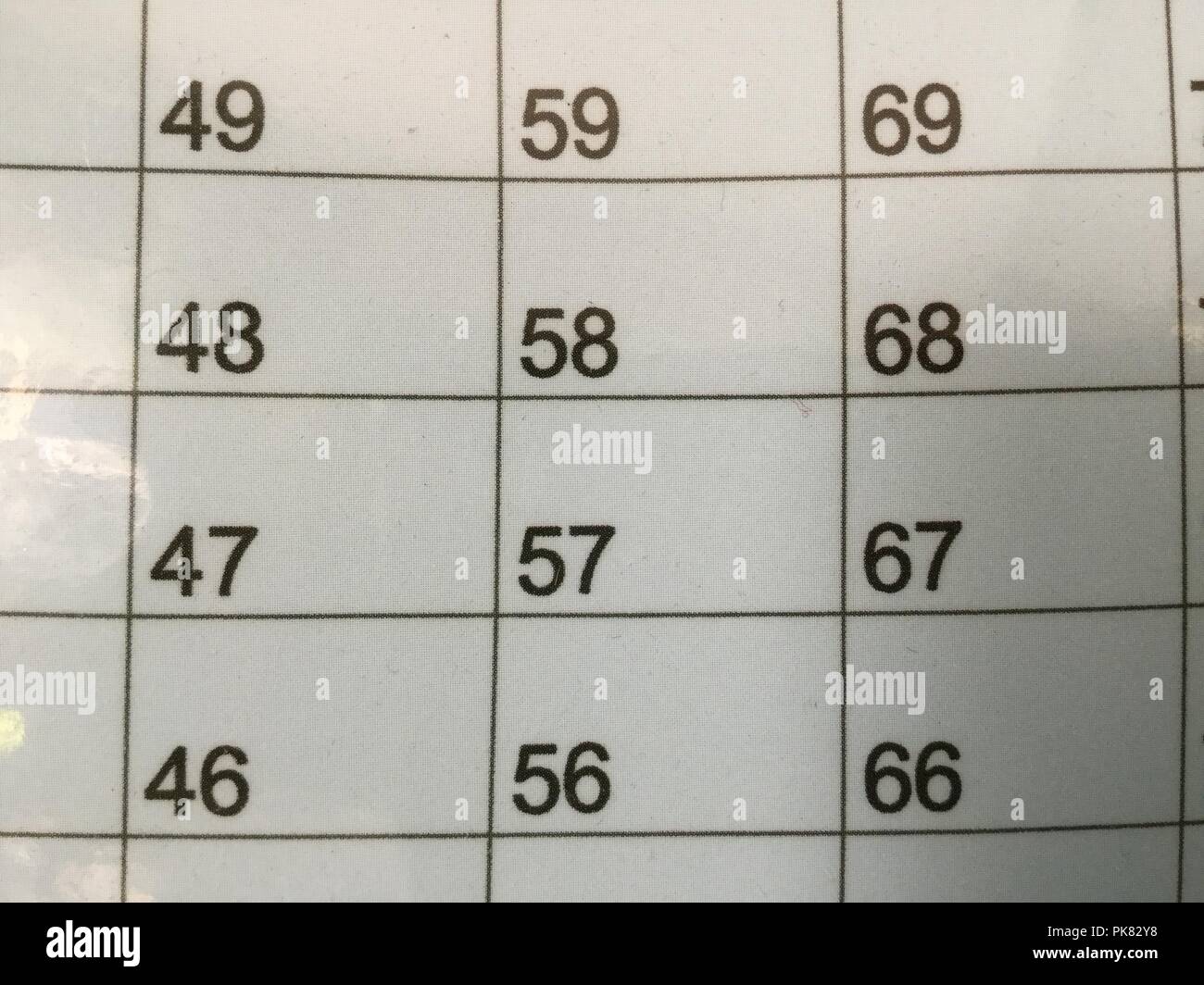 Grid displaying numbers against a white background Stock Photo - Alamy