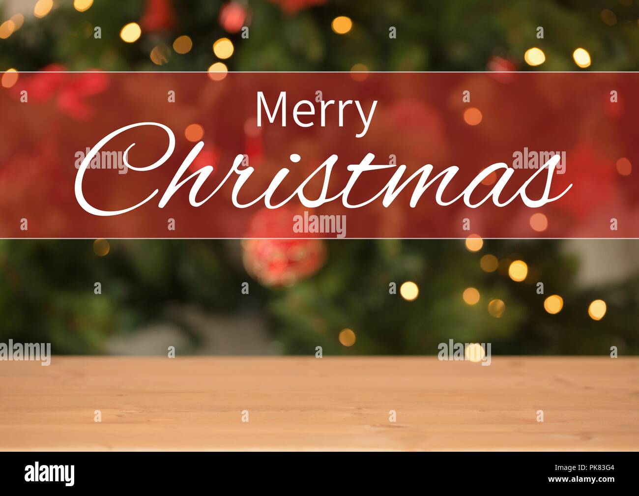 Merry Christmas text with Christmas tree lights Stock Photo - Alamy