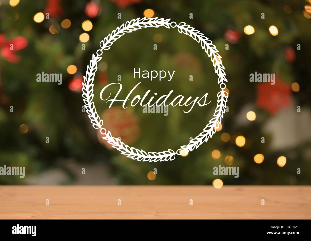 Happy Holidays text with Christmas lights Stock Photo - Alamy