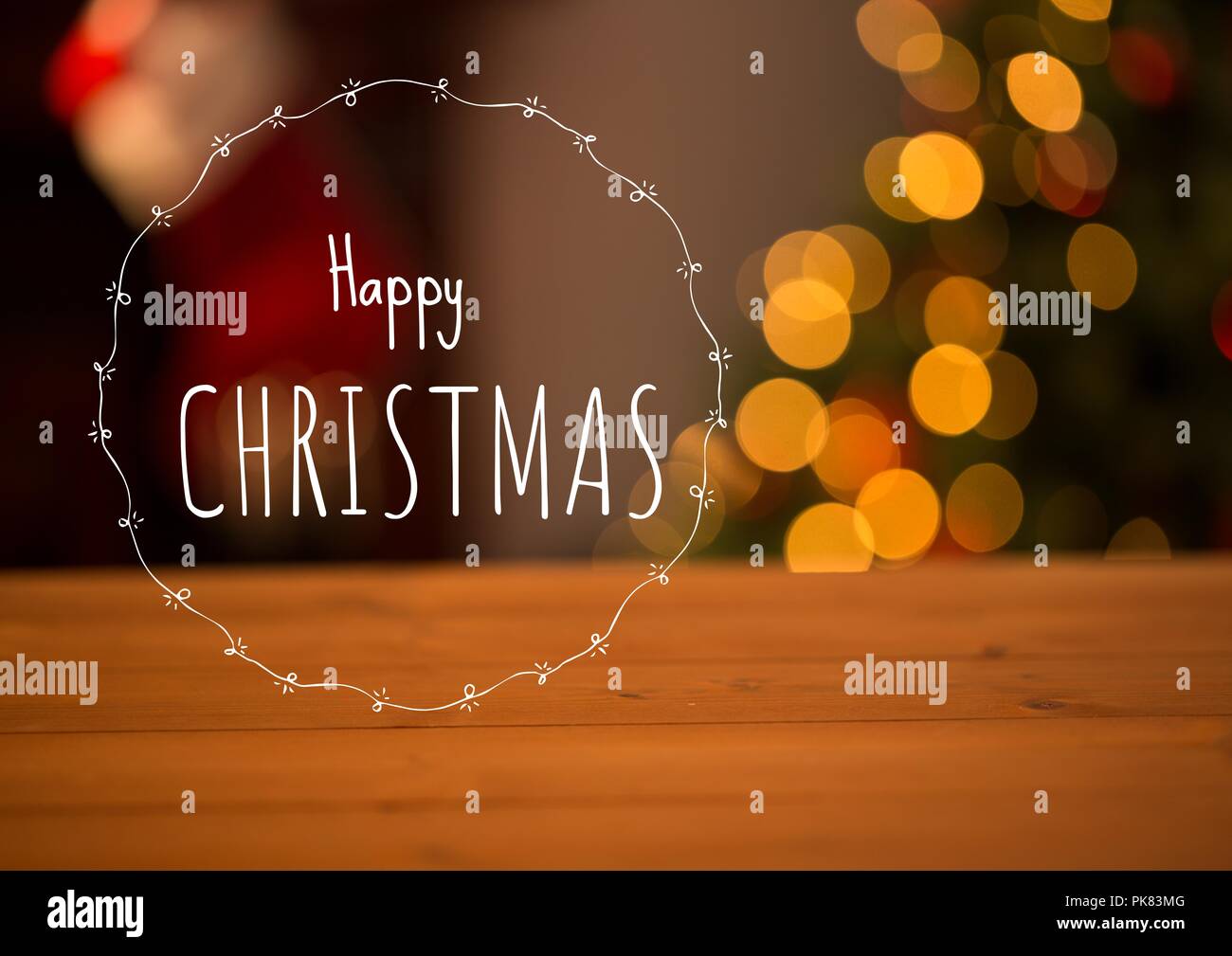 Happy Christmas text with home Stock Photo - Alamy