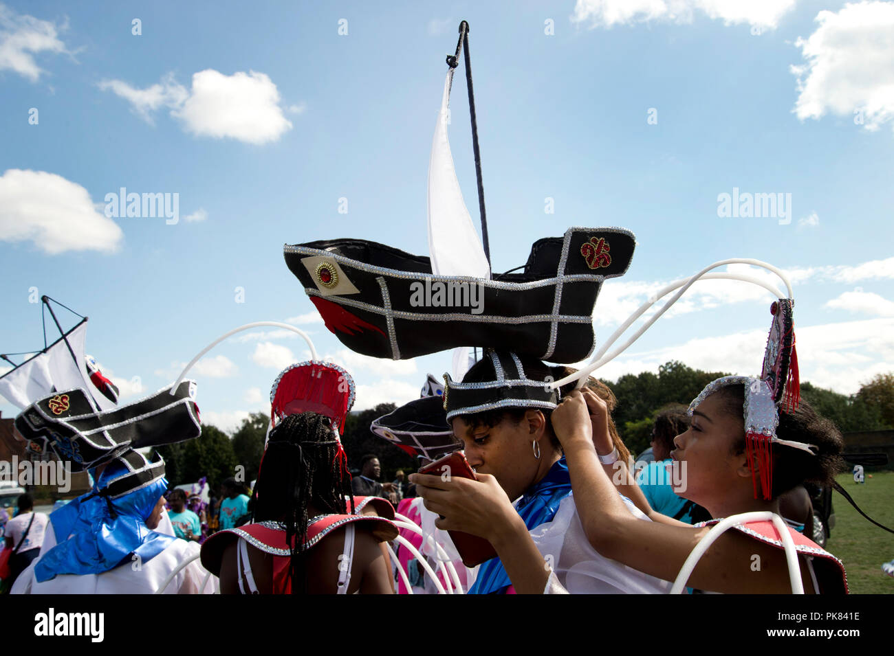 Hackney Carnival September 9th 2018. A performer in costume has his ...