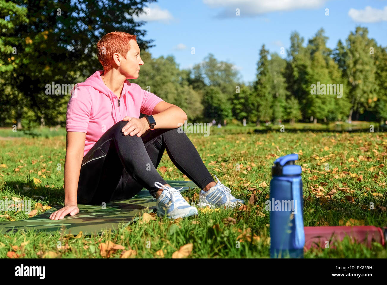 Sporty girl outdoors conducting sport exercises. Healthy lifestyle ...