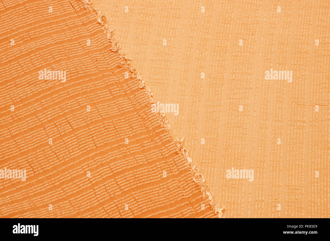 Cotton fabric peach color Stock Photo - Alamy