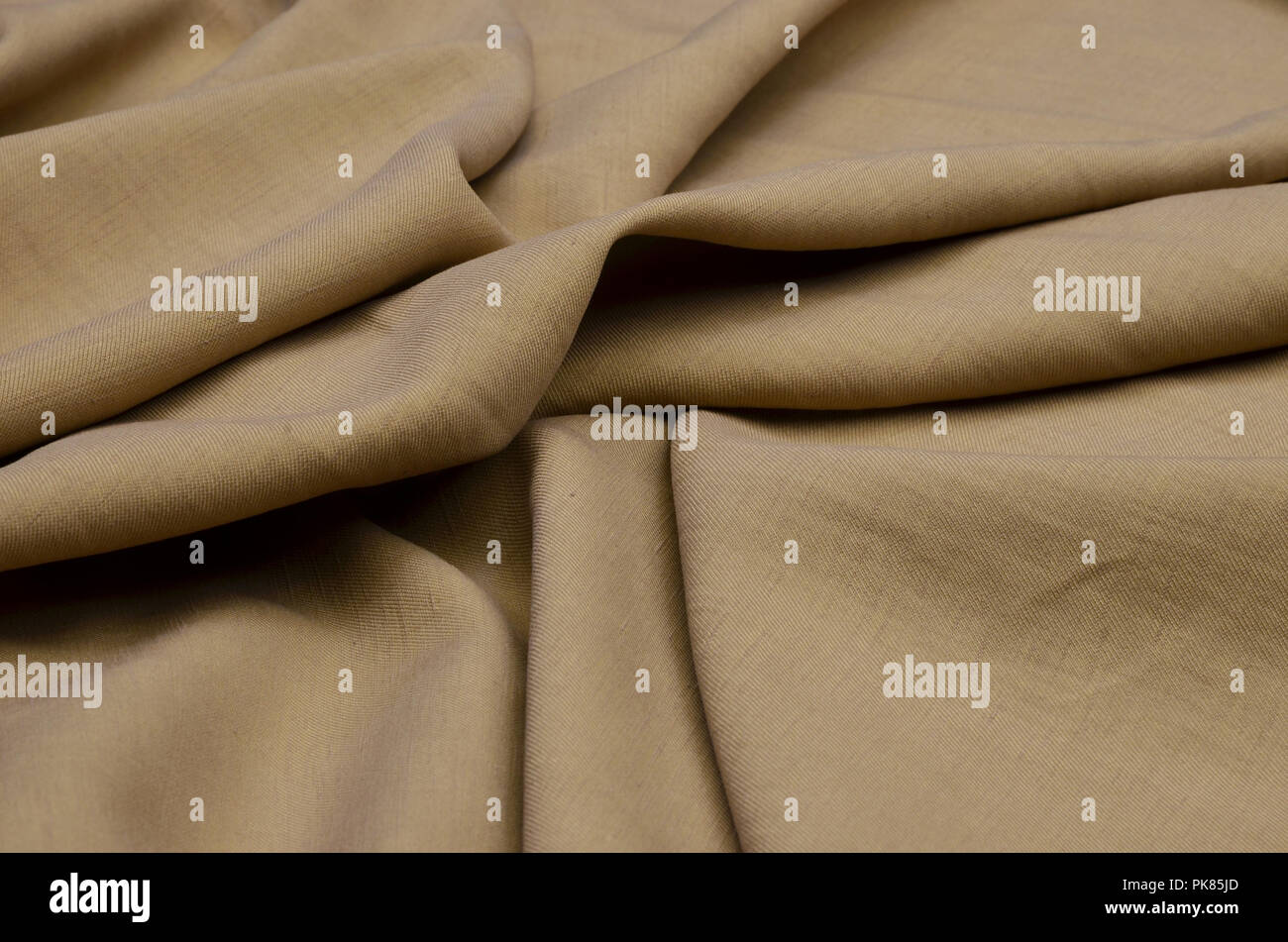 Cotton fabric of light brown color Stock Photo - Alamy