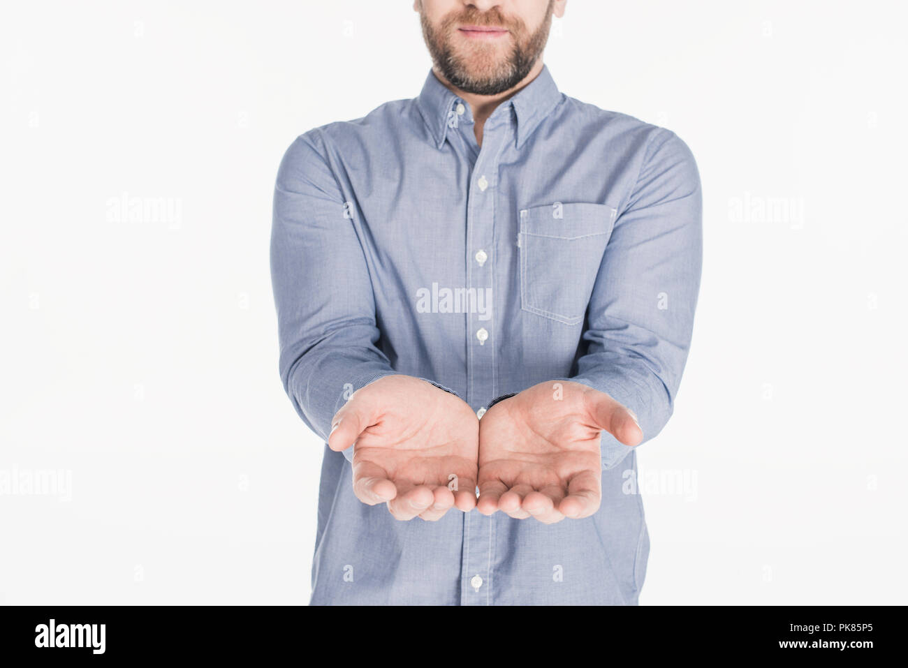 partial view of man with outstretched hands isolated on white Stock ...