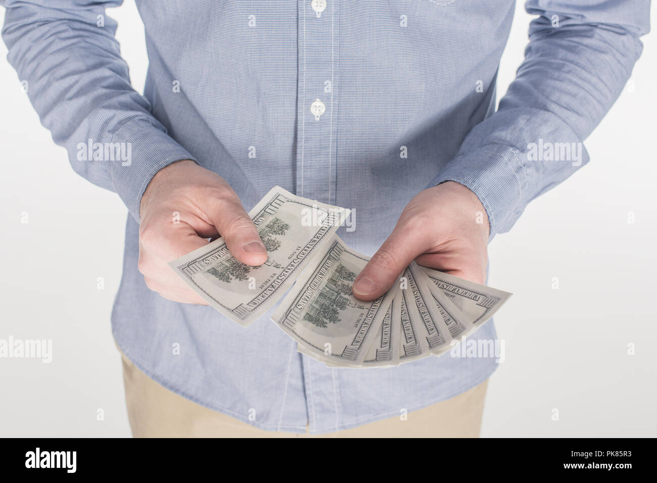 Counting dollar banknotes in hand hi-res stock photography and images ...