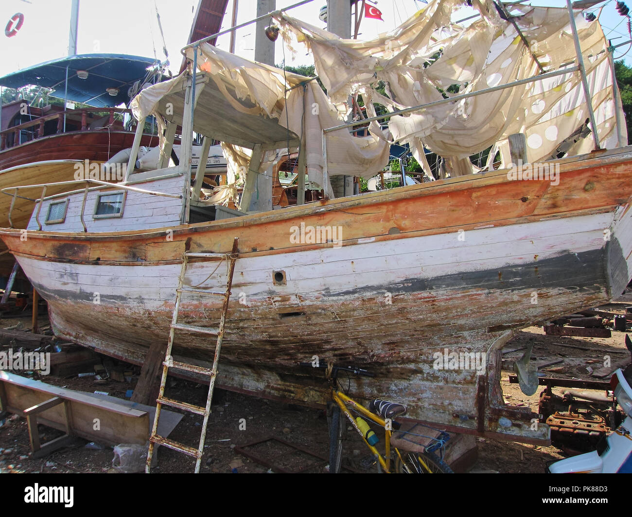 Boats being repaired and built in a ship building yard in Fethiye ...
