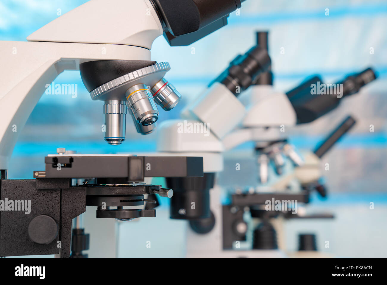 Four microscopes of different designs in the laboratory Stock Photo - Alamy