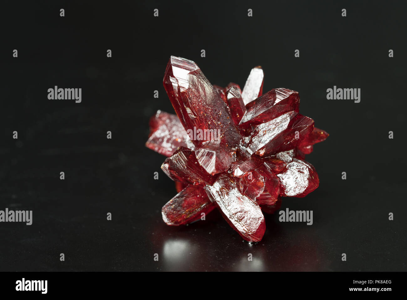 Red natural crystal. Natural mineral Stock Photo - Alamy