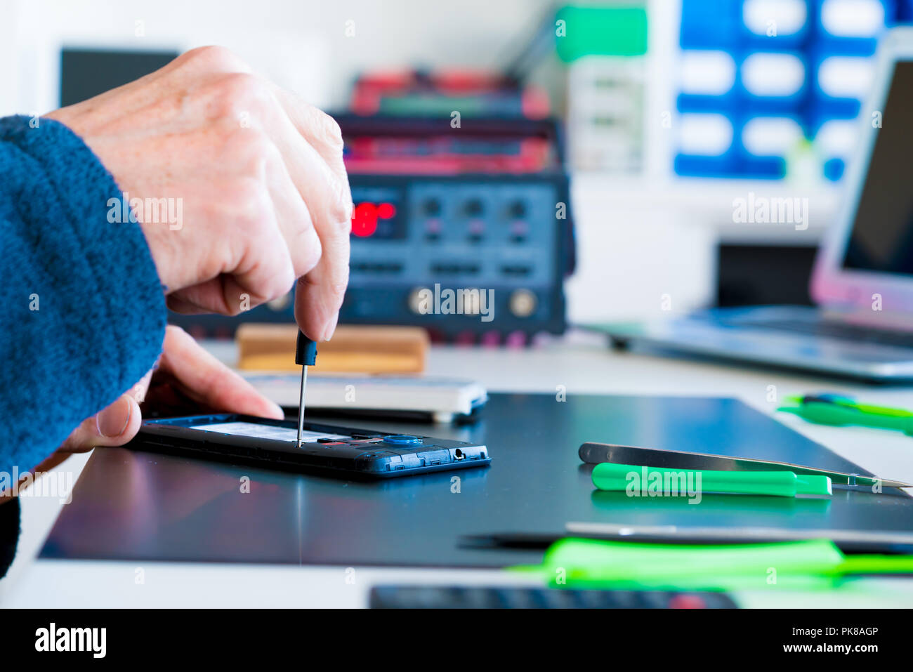 Fix and repair cell phone PCB Stock Photo - Alamy