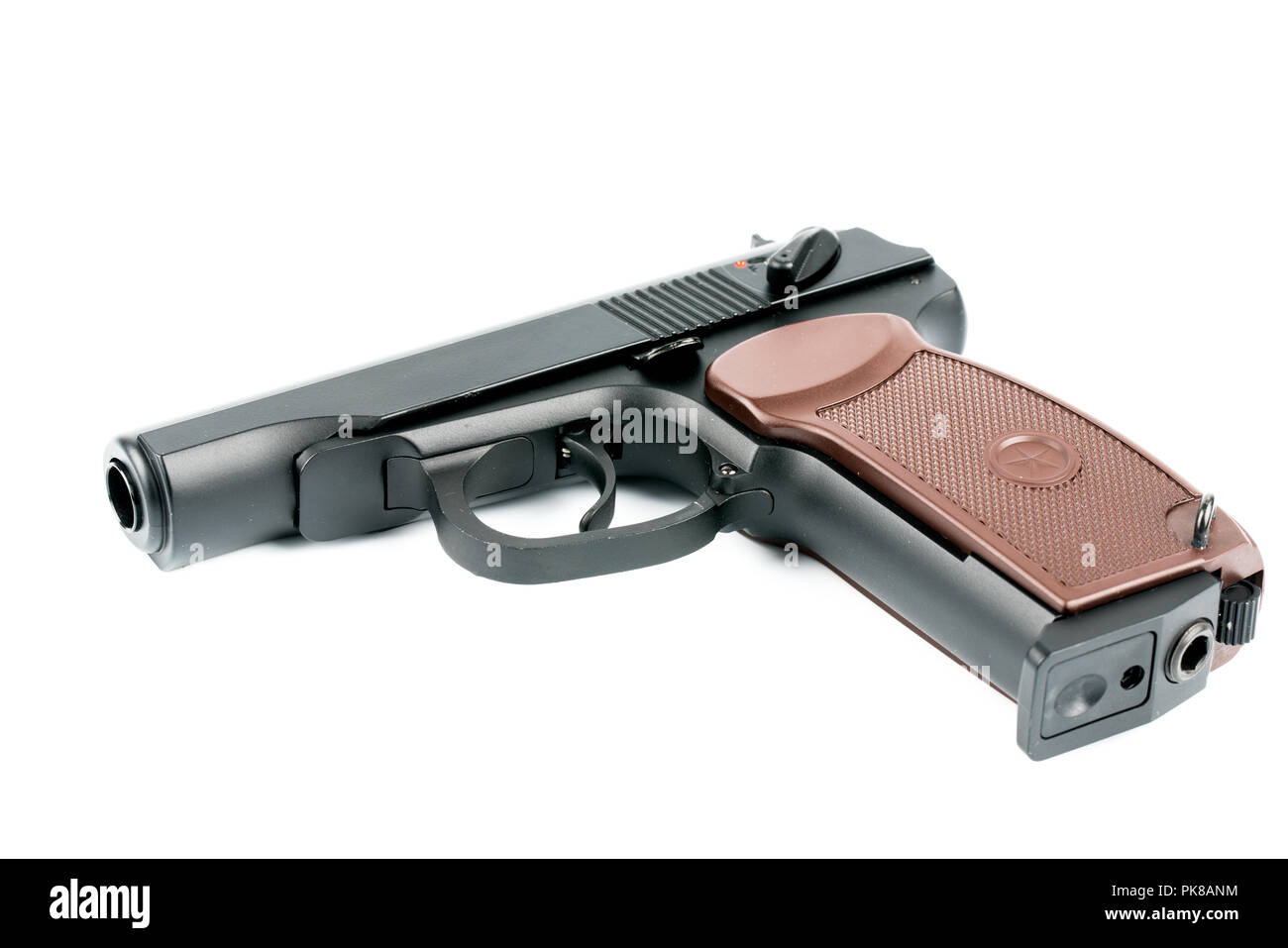 Automatic gun pistol on dark background Stock Photo - Alamy