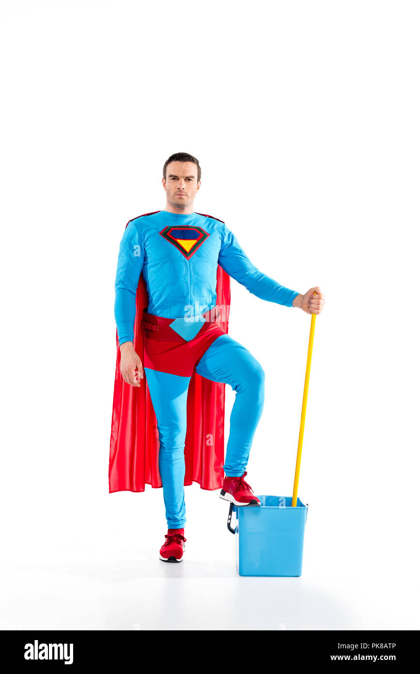 confident man in superhero costume standing with mop and bucket ...