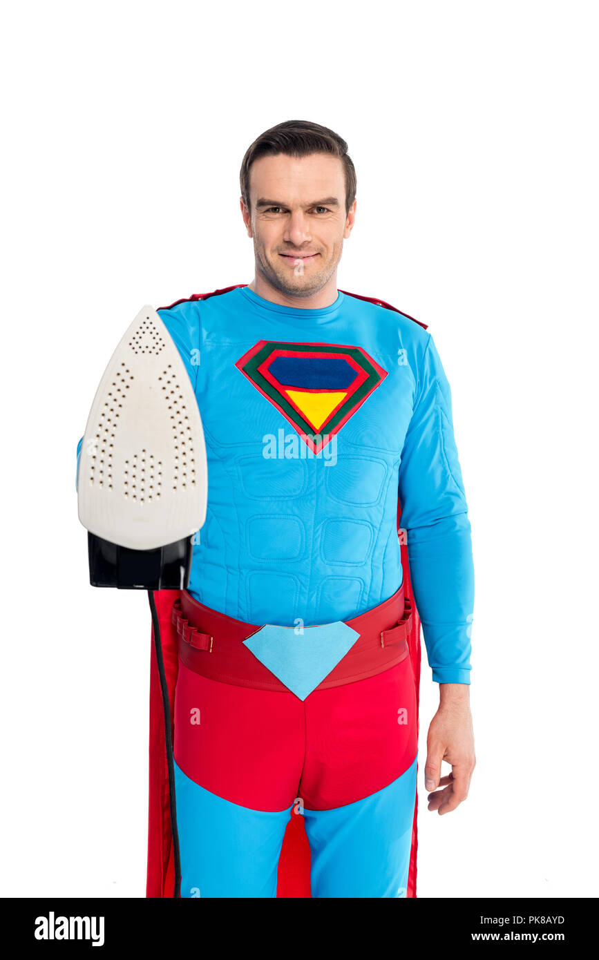 handsome man in superhero costume holding iron and smiling at camera ...