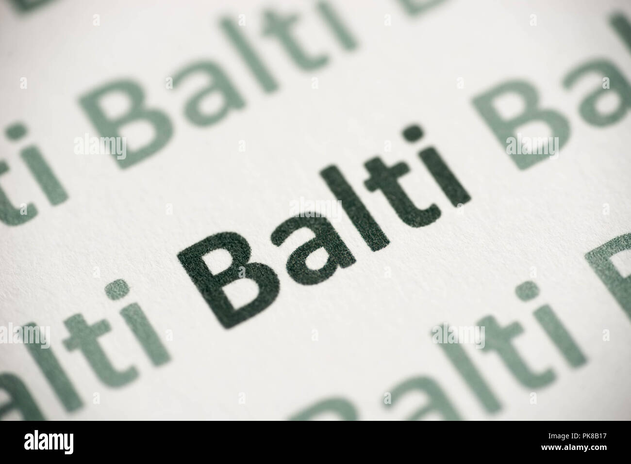 word Balti language printed on white paper macro Stock Photo - Alamy