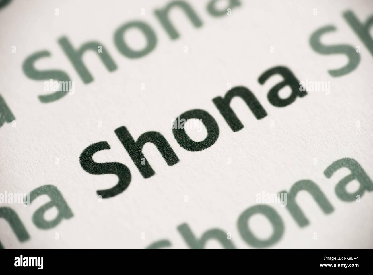 word Shona language printed on white paper macro Stock Photo - Alamy