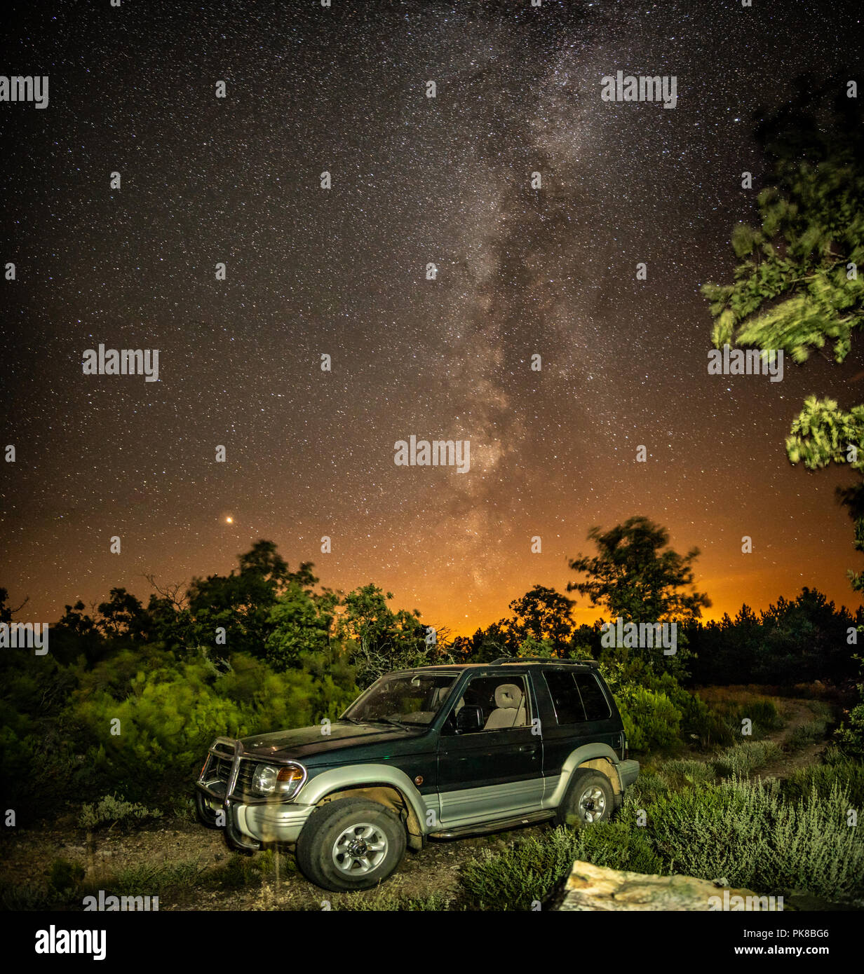 4x4 vehicle at night with milky way Stock Photo - Alamy
