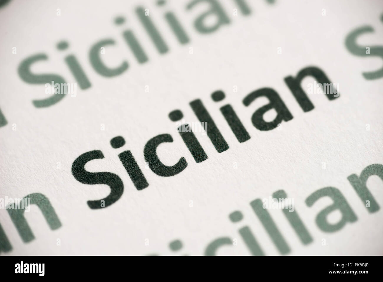word Sicilian language printed on white paper macro Stock Photo - Alamy