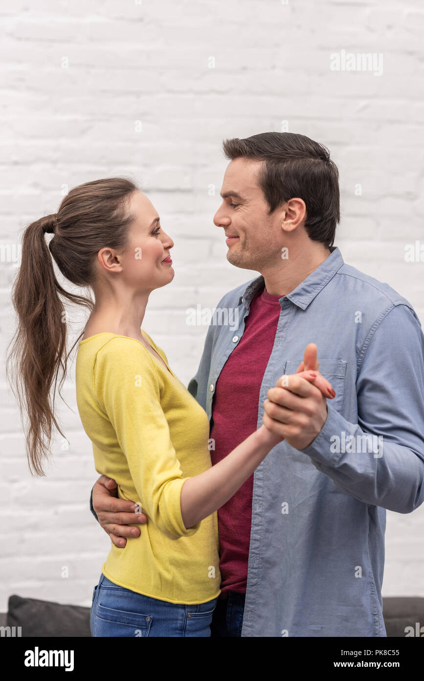 Man in front of white wall dancing hi-res stock photography and images ...