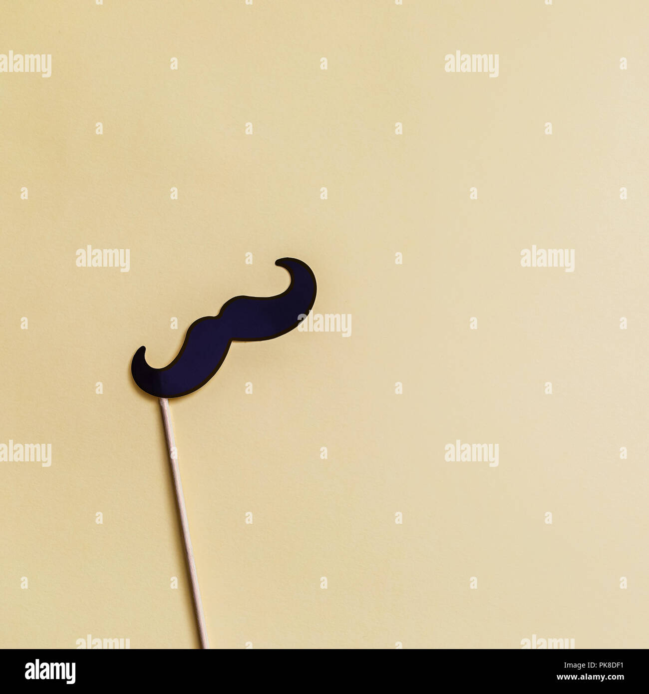 Moustache photo booth prop on yellow background, isolated Stock Photo ...