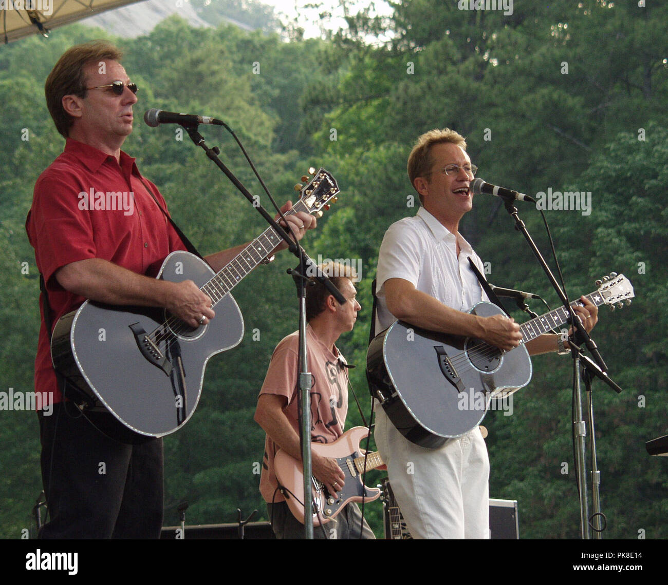 Dewey Bunnell, Michael Woods, and Gerry Buckley of America perform at ...