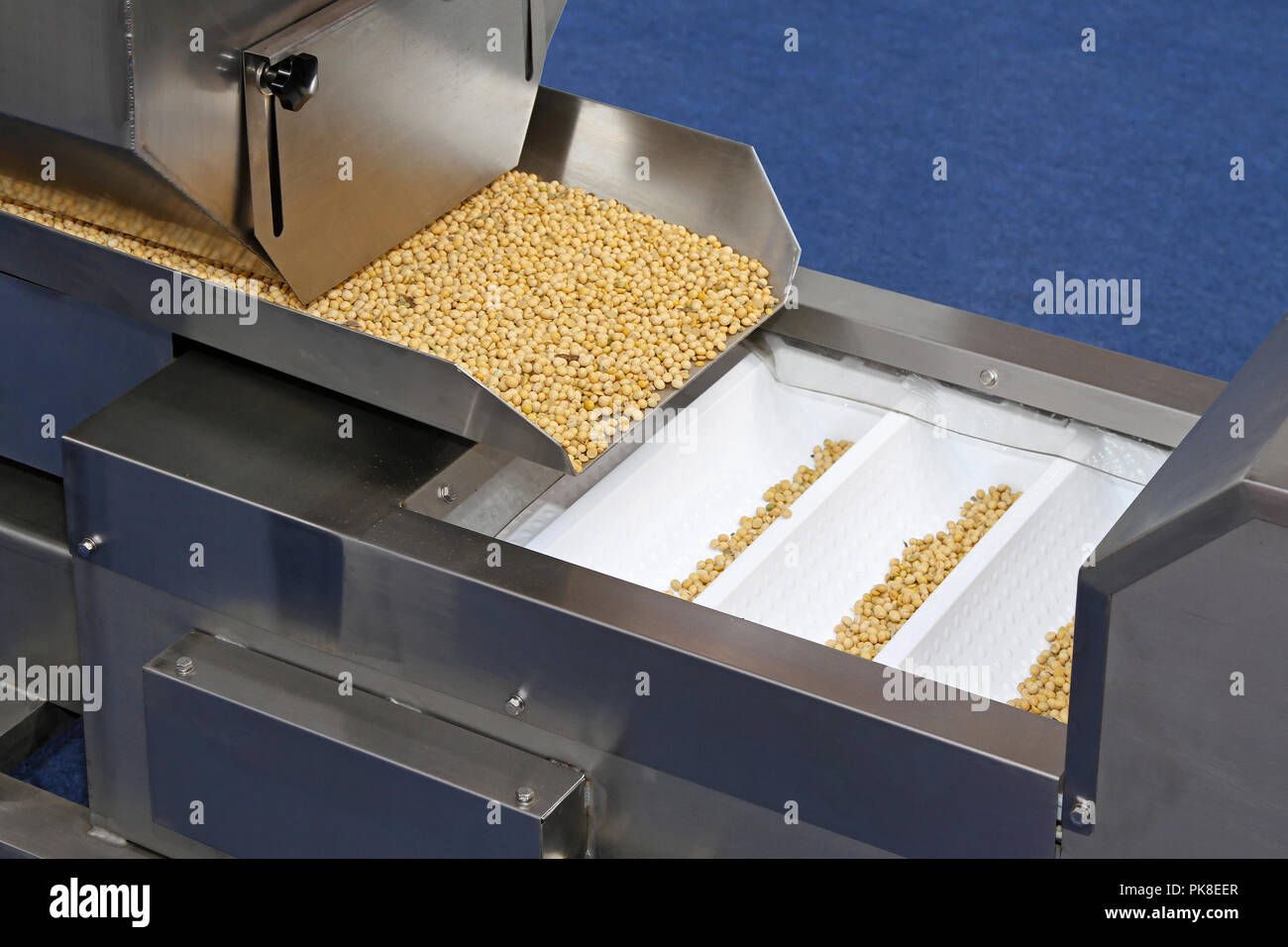 Automated grains food packaging machine production line Stock Photo - Alamy