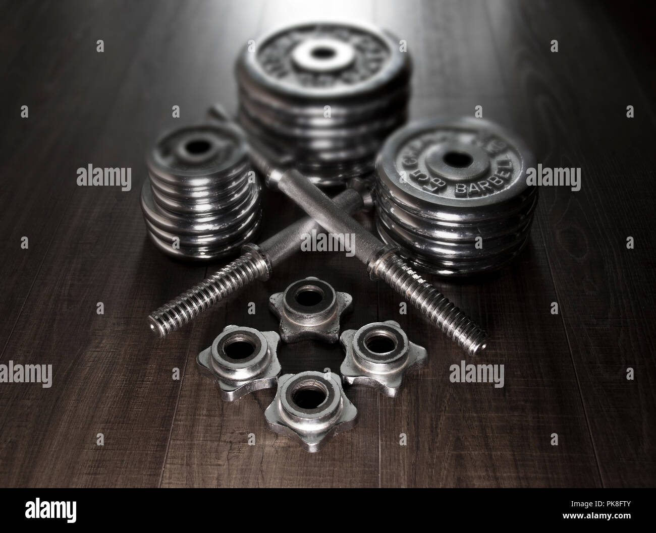 Work out set of weights and barbells at the gym. Health and fitness ...