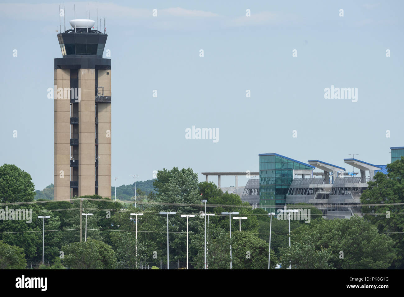 Charlotte, NC - May 14, 2017/USA: Flight tower overlooks take-off and ...