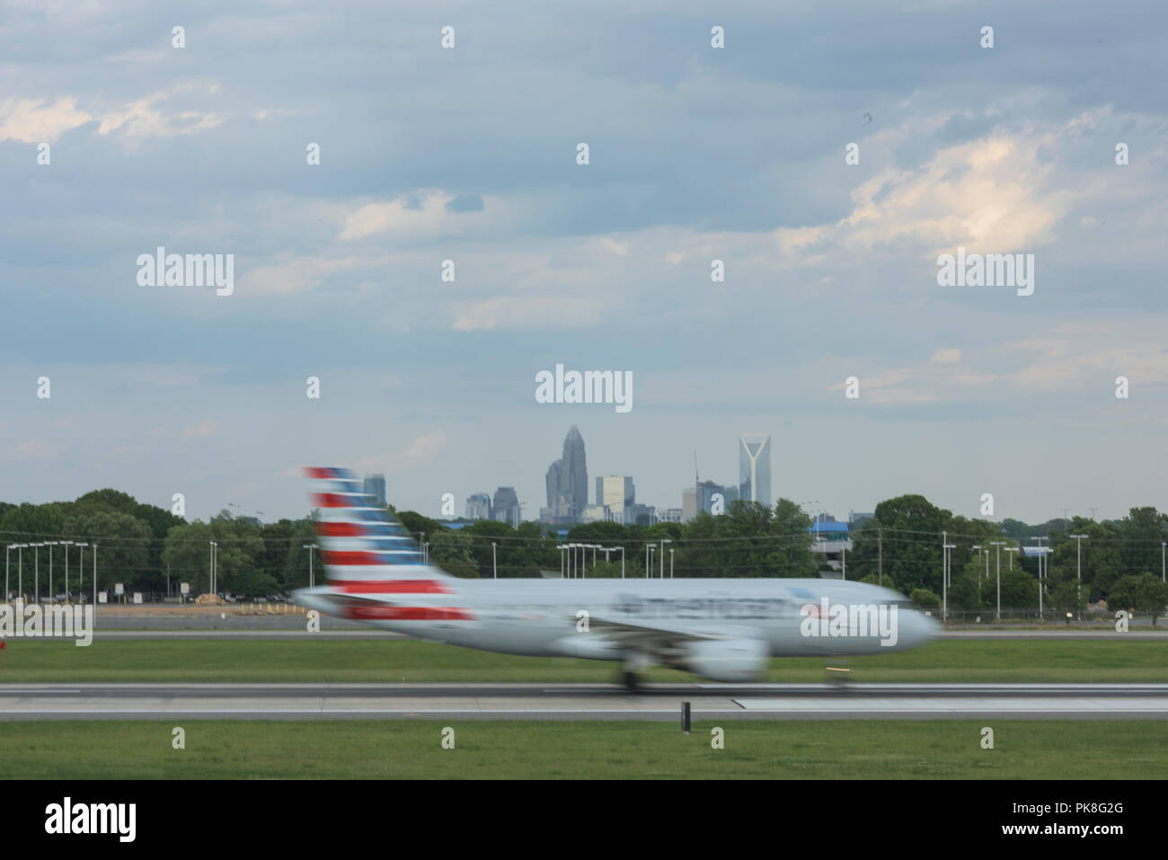 Charlotte, NC - May 14, 2017/USA: People watch descent of a commercial ...