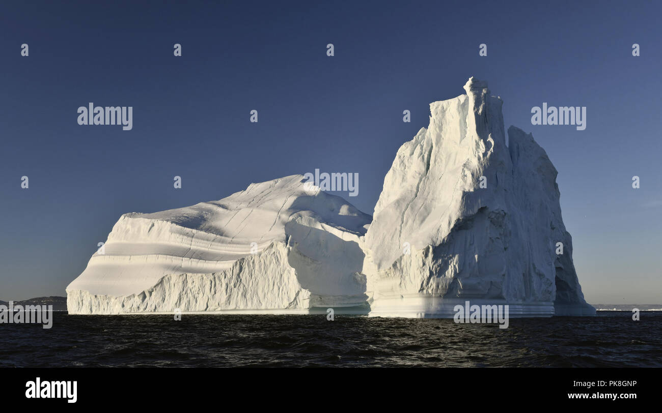Iceberg floating in the water off the coast of Greenland. Nature and ...