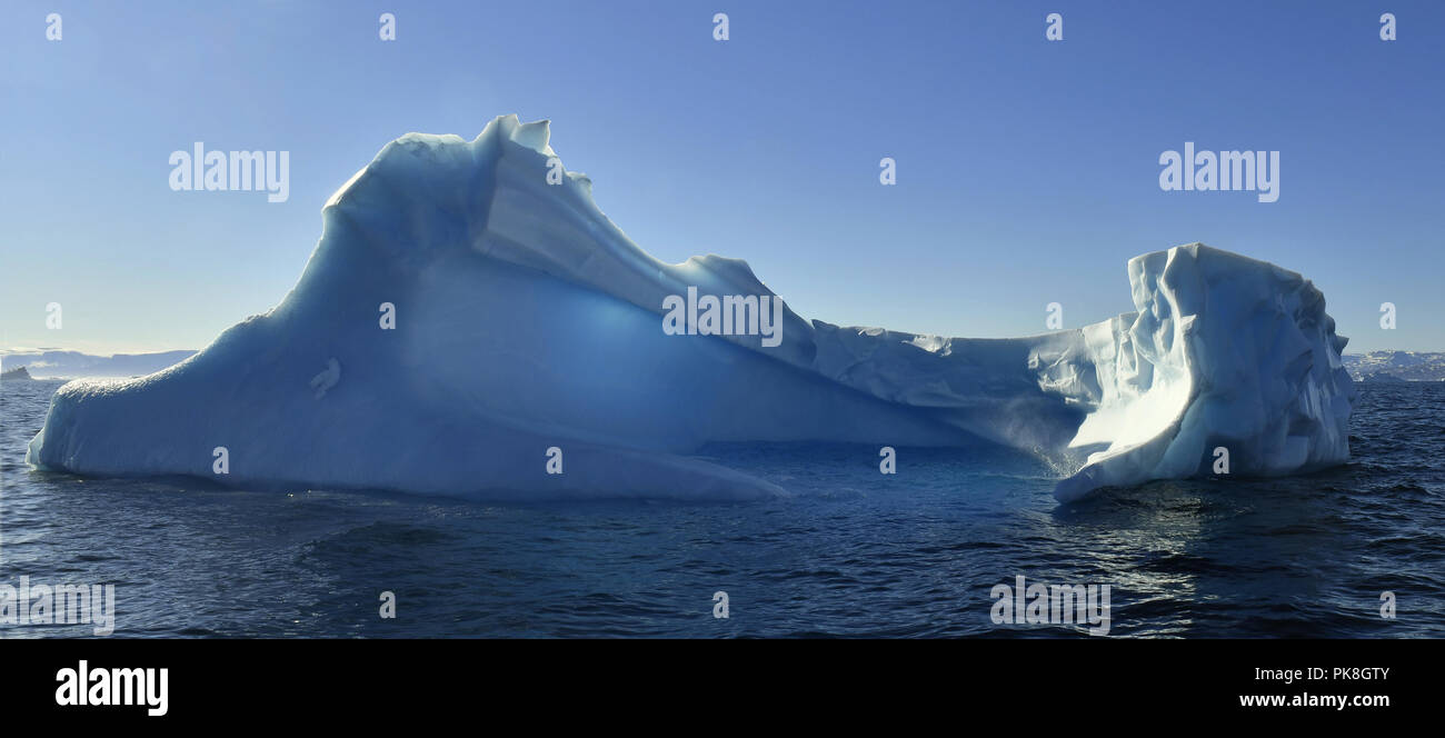 Iceberg floating in the water off the coast of Greenland. Nature and ...