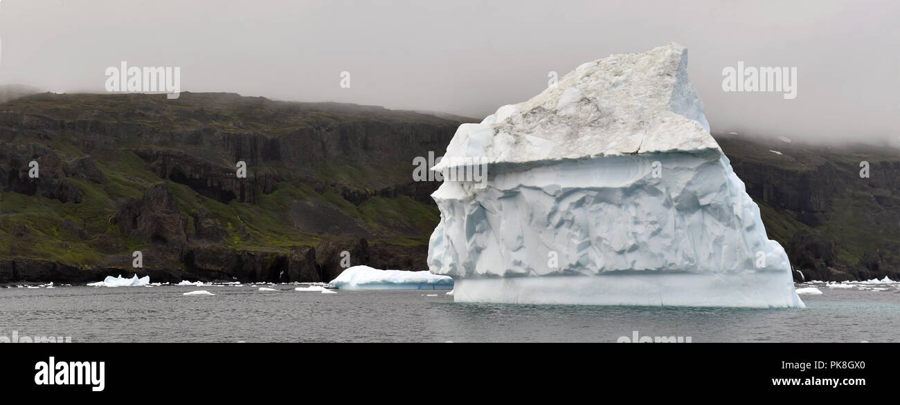 Iceberg floating in the water off the coast of Greenland. Nature and ...