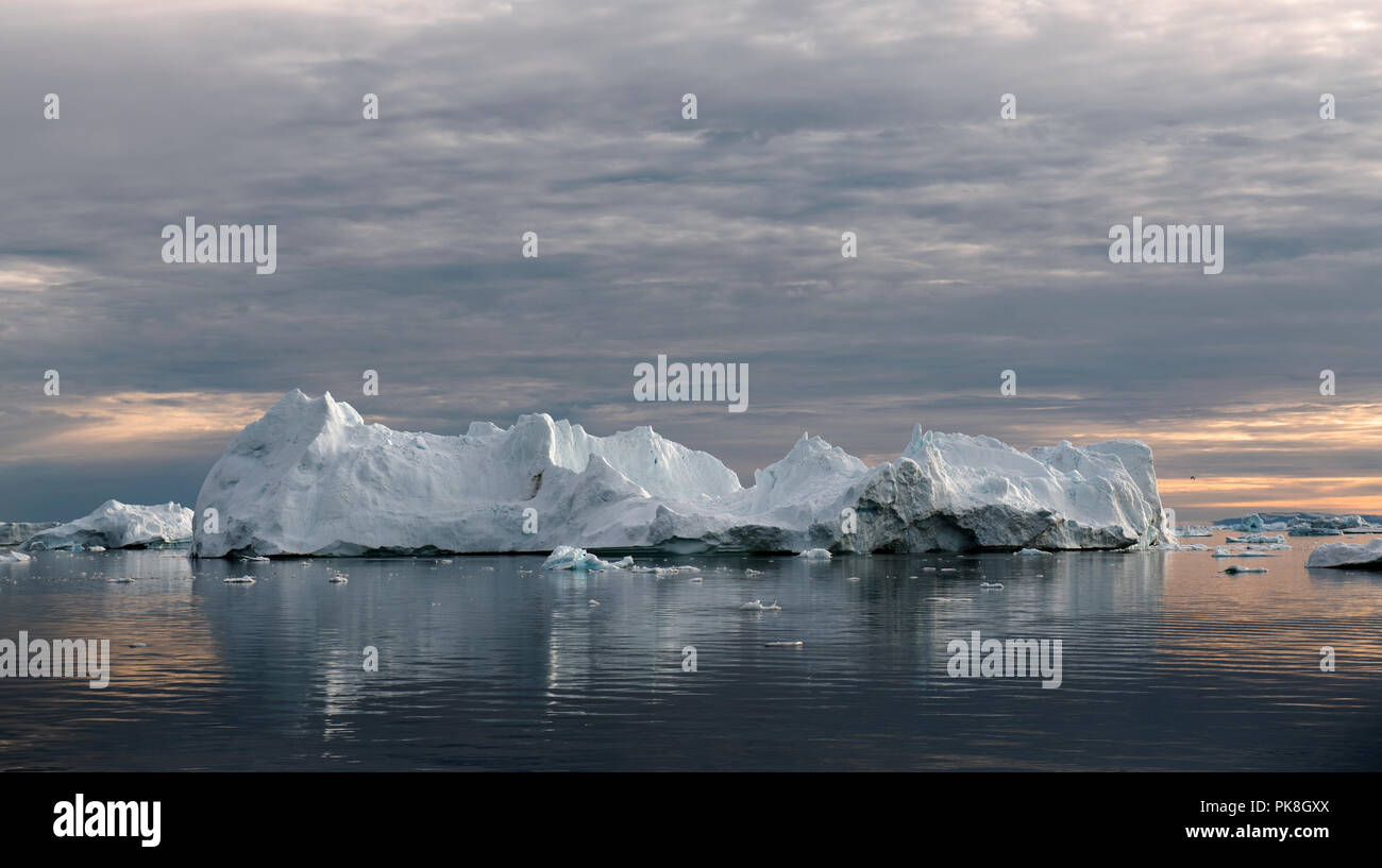Iceberg floating in the water off the coast of Greenland. Nature and ...